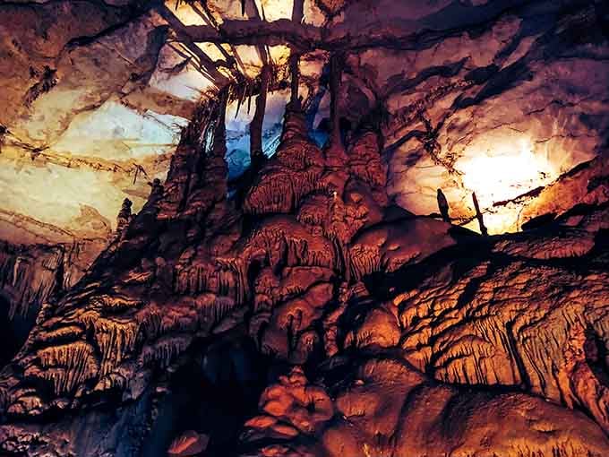 Dramatic lighting turns these towering stalagmites into nature's own rock concert stage, complete with natural special effects.
