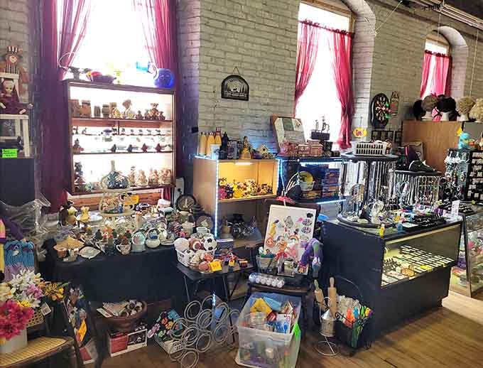 Sunshine streams through open spaces where vendors display everything from household goods to unexpected treasures outdoors.