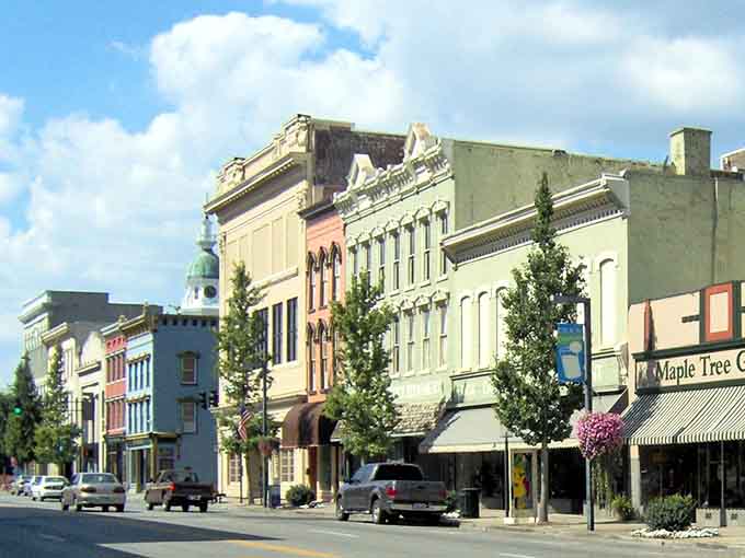 Pastel buildings and young trees prove that even historic downtowns know how to freshen up their look.