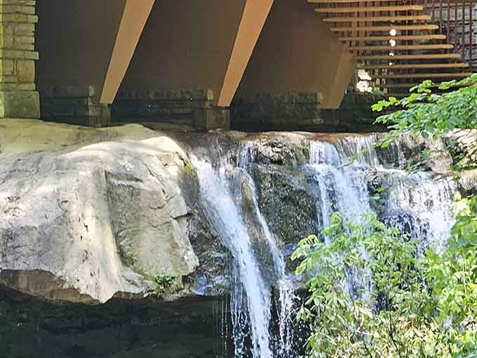 The cascade beneath the cantilevered terraces creates a soundtrack that never gets old, day or night, year-round.