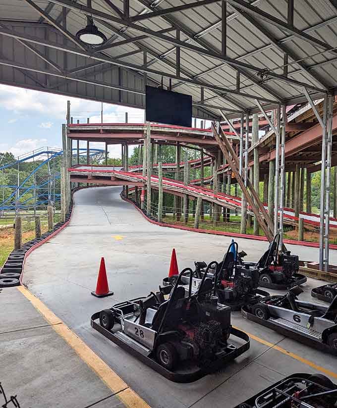 Karts line up beneath the covered section, ready to tackle those gravity-defying elevation changes ahead.