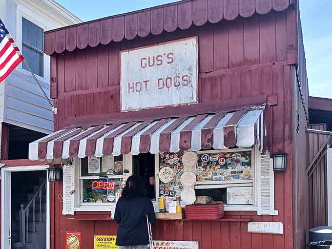 The sticker-covered window tells stories of loyal fans who've been coming here longer than some marriages last.