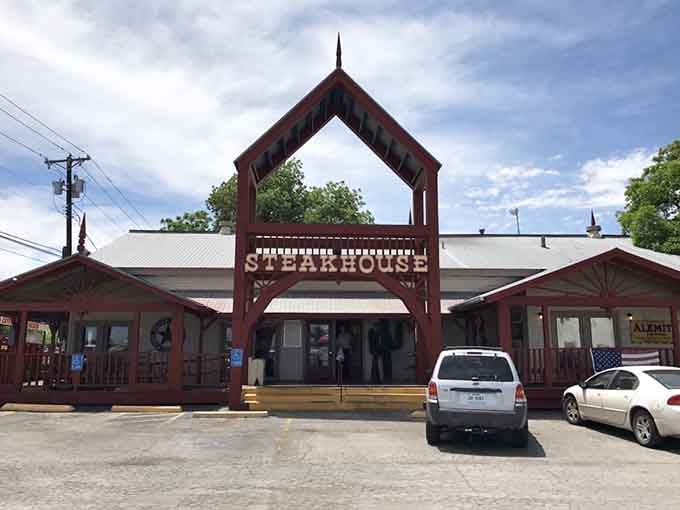 Under those summer clouds, this welcoming facade promises the kind of meal worth canceling other plans for.