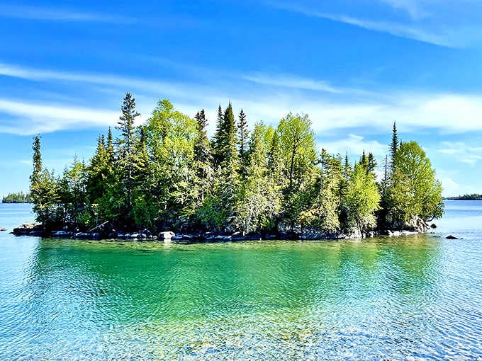 This tiny forested island rising from aqua waters looks like something Bob Ross would paint on a particularly inspired day.