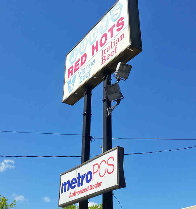 That towering sign against blue sky announces Vienna hot dogs and Italian beef like a beacon of deliciousness.