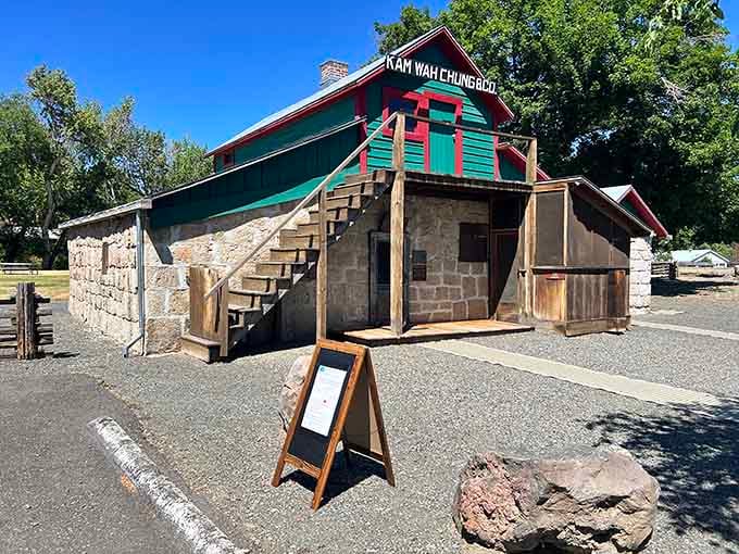 The exterior staircase leads to upper rooms where traditional medicine and cultural traditions were carefully preserved.