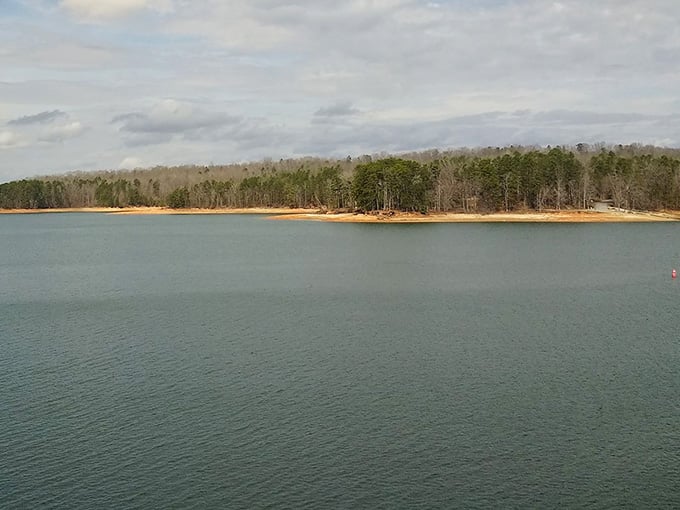 Islands rise from jade-green waters under moody skies, creating a landscape that feels wonderfully remote and peaceful.