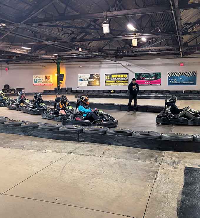 The checkered flag station stands ready while racers navigate turns that would make Mario Andretti crack a knowing smile.