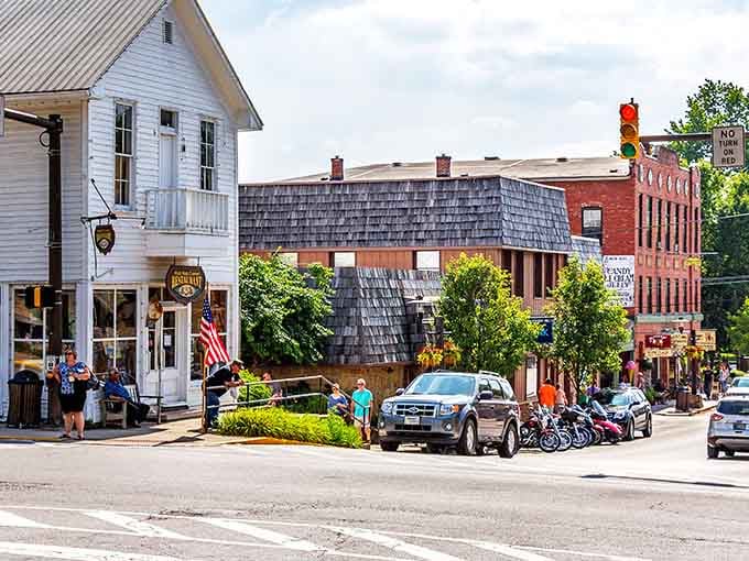 The white steeple rises above the trees like a beacon, guiding visitors to this creative community.
