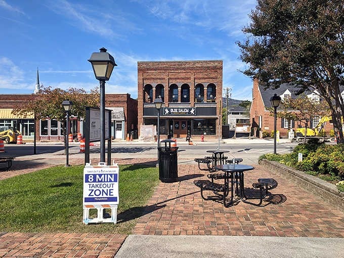 Downtown brick pavers and wrought-iron benches create the perfect spot for people-watching and daydreaming together.