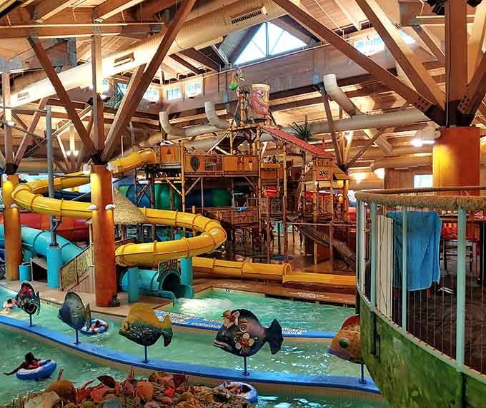 The tree house structure rises majestically, promising adventure around every colorful corner and platform level.