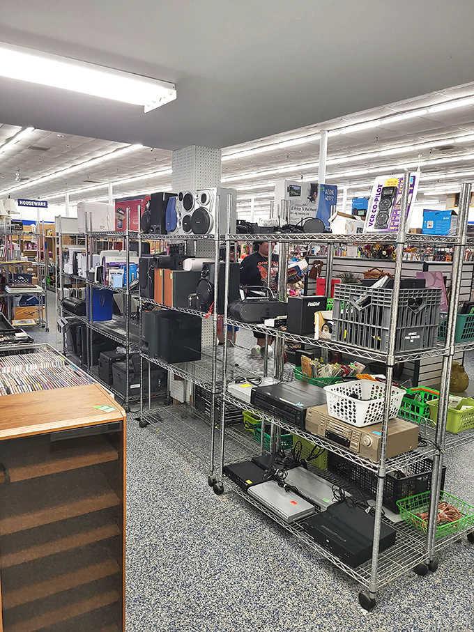 Towers of stereos, speakers, and electronics stacked on rolling shelves &mdash; it's like a yard sale met a RadioShack and never looked back.