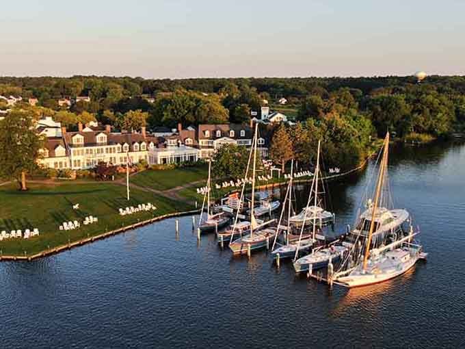 Sailboats lined up at sunset create a view that makes you want to quit your job and become a sailor.