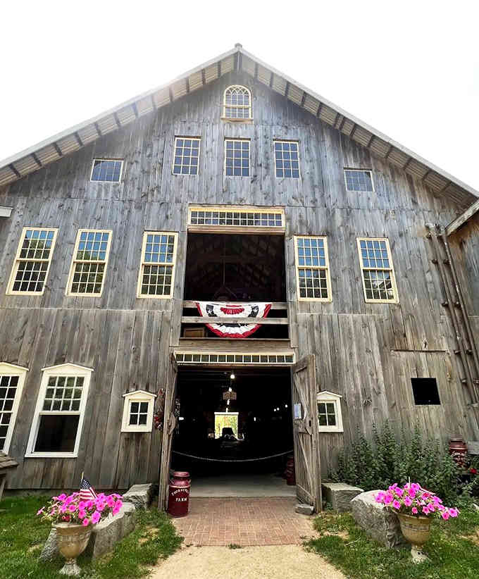 The patriotic bunting and flower planters frame this rustic entrance—farm-fresh chocolate never looked so picture-perfect and inviting.