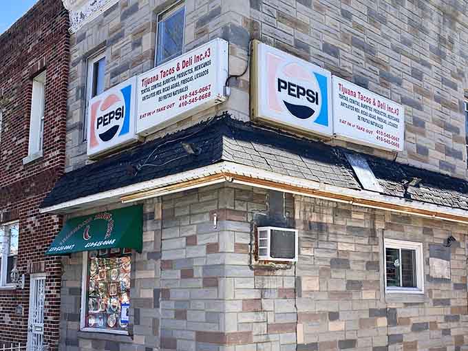 The weathered brick and classic signage create an authentic charm that fancy chains can never quite replicate successfully.
