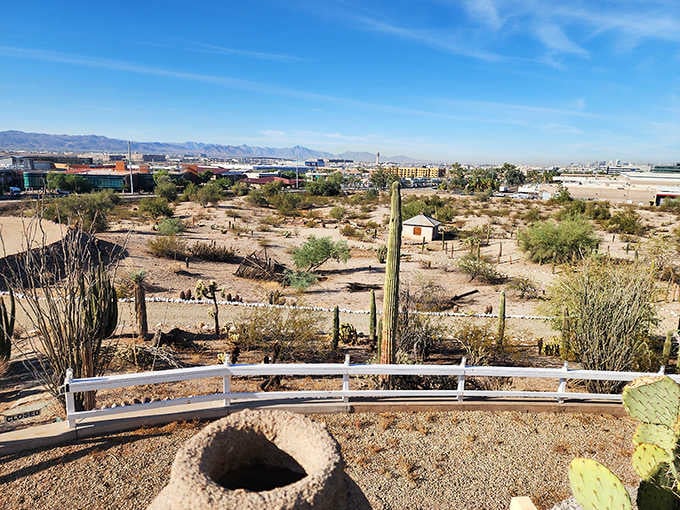 The view from up here shows how this quirky landmark sits surrounded by desert stretching toward the city.