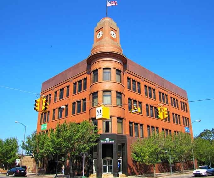 The rounded corner tower catches your eye immediately, a architectural gem that anchors the entire downtown with timeless elegance.
