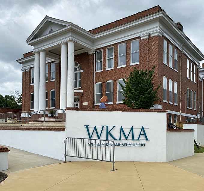 Classical columns frame a cultural treasure where regional artists shine alongside contemporary masters from everywhere.