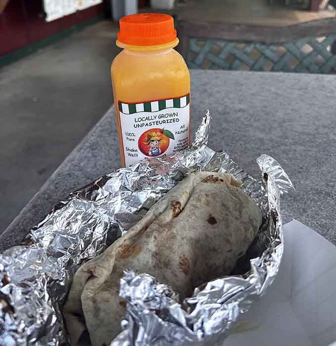 Wrapped up and ready to satisfy, this burrito comes with locally grown orange juice because Florida knows its citrus game.