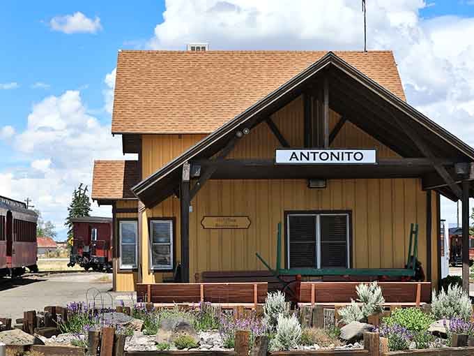 The Cumbres & Toltec depot waits patiently for its next adventure, surrounded by flowers and mountain views that never get old.