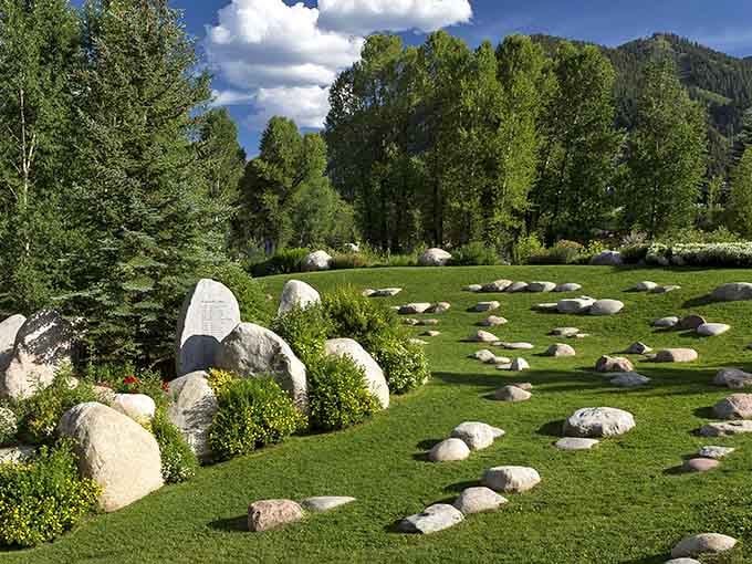 The John Denver Sanctuary's stone spiral garden offers peaceful riverside reflection where lyrics meet landscape beautifully.
