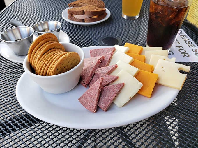 Behold the large cheese plate: crackers, meats, and enough Wisconsin cheese to make your cardiologist weep with joy.