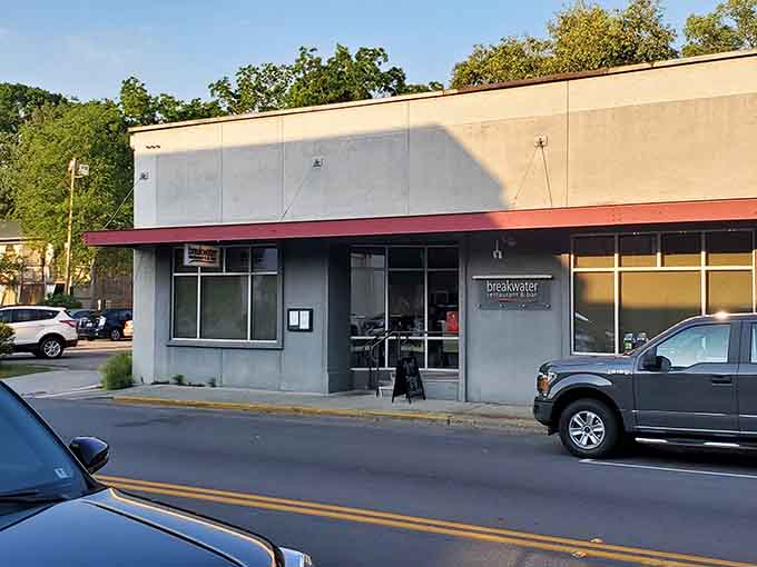 Modern minimalism meets coastal charm in this sleek storefront that proves contemporary design belongs here too.