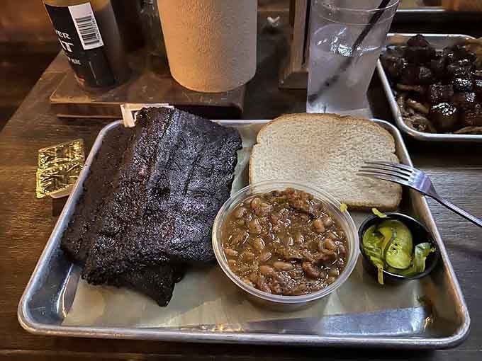 Baby back ribs with a dark mahogany bark that would make any pitmaster proud, served simply because they need no introduction.