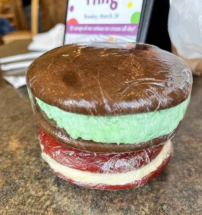 This stacked beauty looks like Dr. Seuss designed a dessert, and honestly, we're here for every colorful layer.