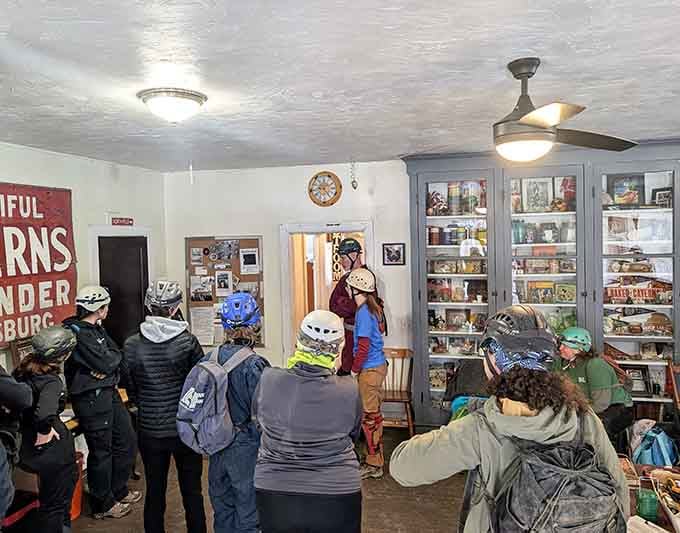 Tour groups gather in cozy quarters before the adventure, surrounded by vintage charm and the promise of underground wonders ahead.