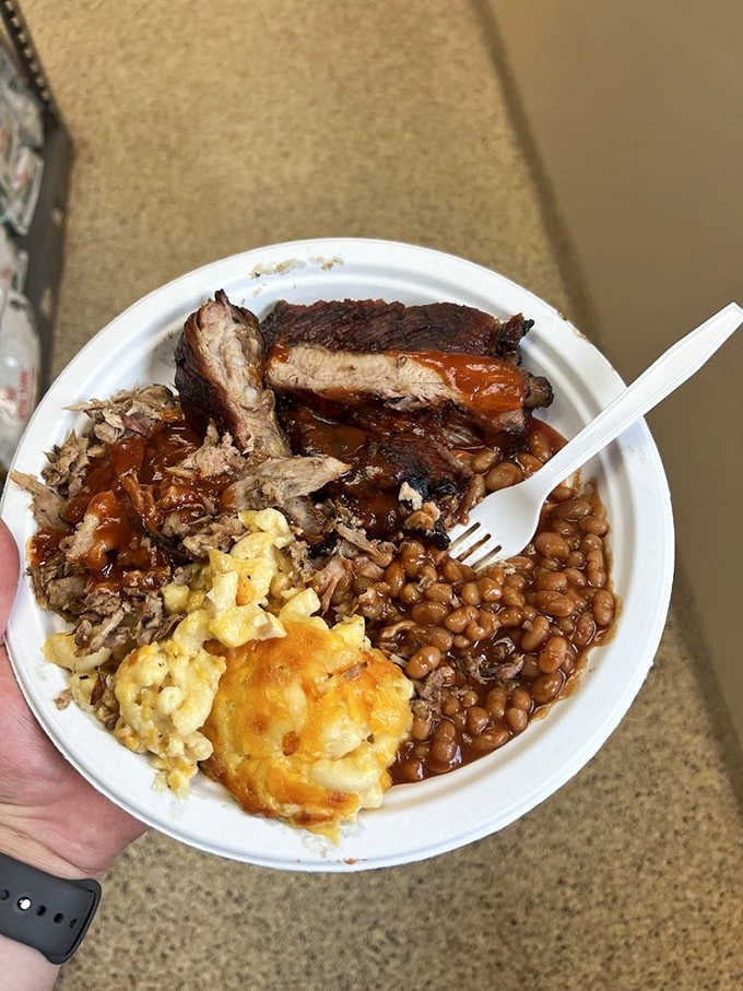 Ribs, chopped pork, beans, and mac and cheese prove that happiness comes on a single plate.