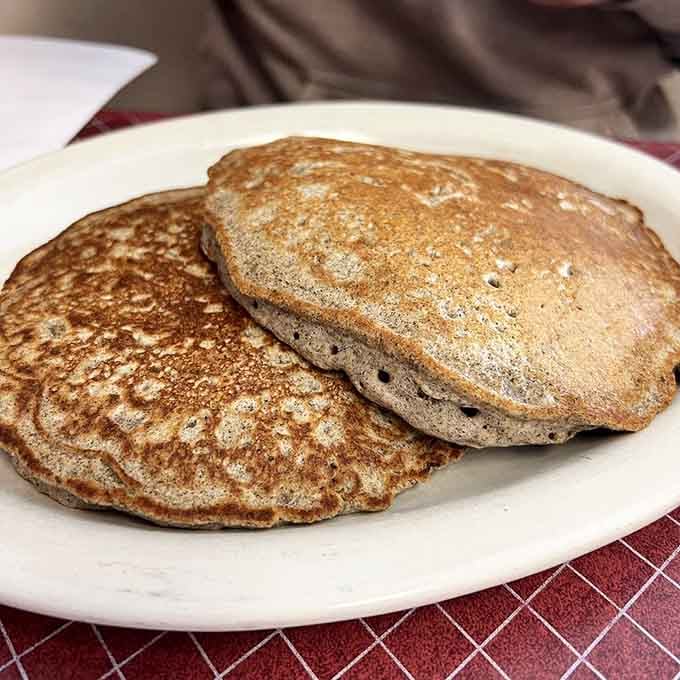 Buckwheat pancakes done right, proving that sometimes the old-fashioned choices are still the best ones around.