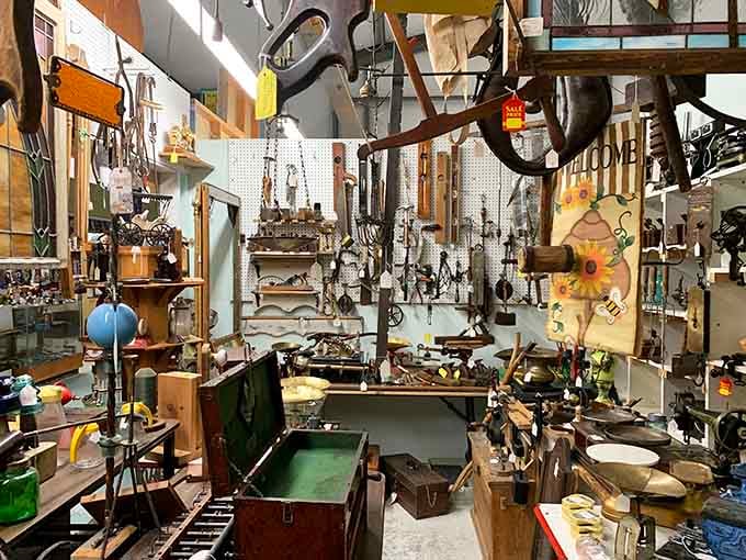 This wall of antique hand tools tells stories of honest work, back when things were built to last generations.