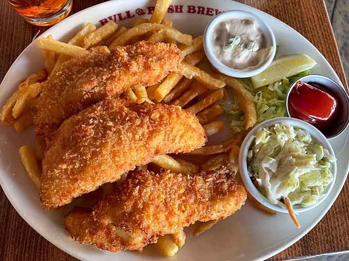 Golden, crispy, and accompanied by tartar sauce that actually knows its job &ndash; this is fish and chips done right.