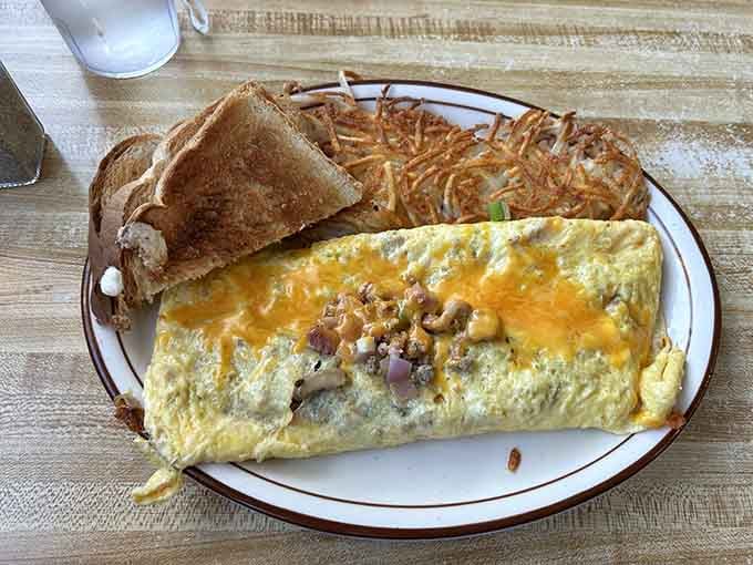 This omelet proves that breakfast doesn't need to be fancy, just generous, golden, and gloriously cheesy.