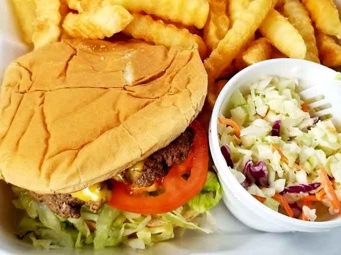 Behold the burger that launches a thousand road trips, complete with fresh toppings and golden fries.