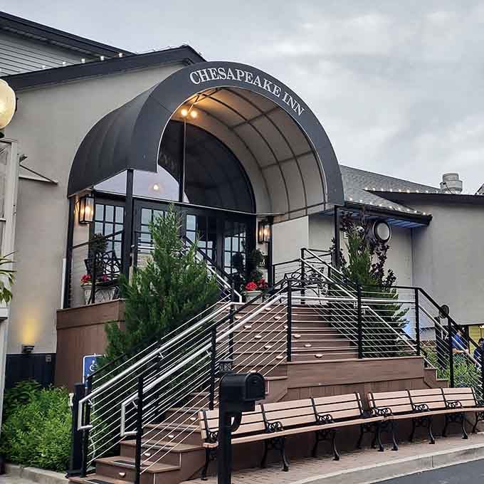 That elegant awning beckons hungry travelers to discover why locals have been keeping this dining secret for generations.