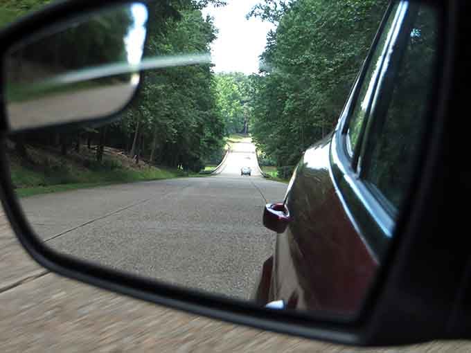 Your rearview mirror becomes a picture frame, capturing moments of beauty that keep getting better behind you.