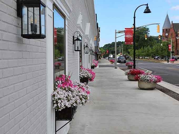 Flower baskets and clean sidewalks prove small towns still care about making Main Street feel welcoming and alive.