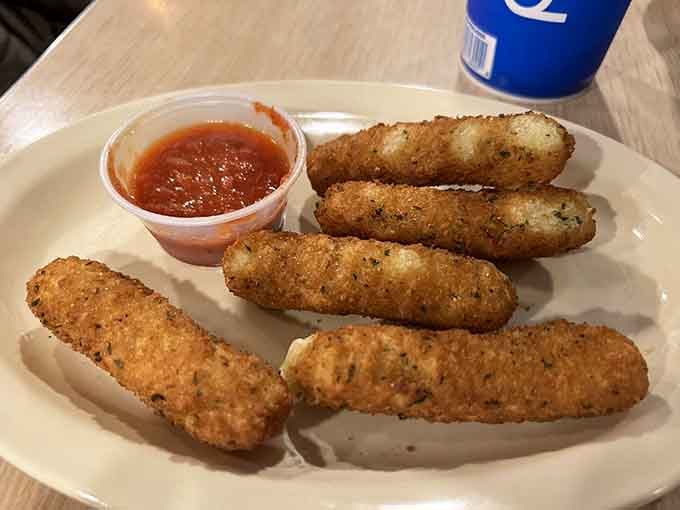 Golden, crispy, and stretching like they're auditioning for a cheese commercial, these sticks don't mess around with portion control.