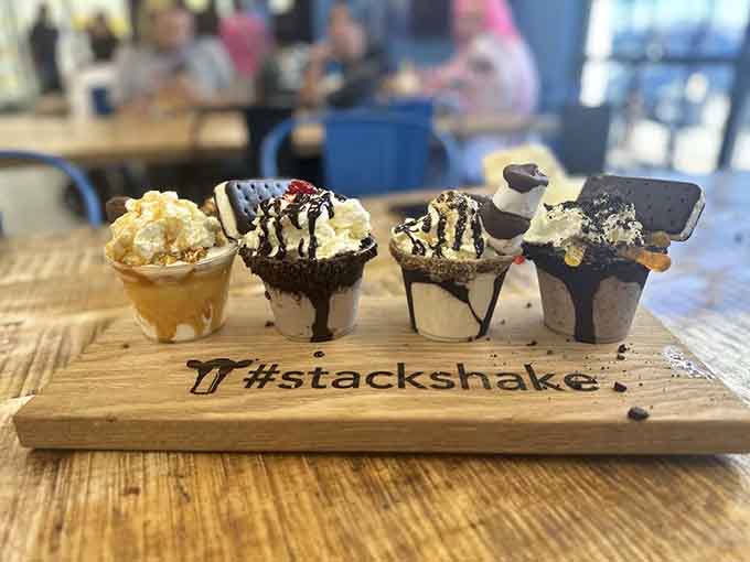 Four mini Stack Shakes lined up like the world's most delicious taste test experiment.