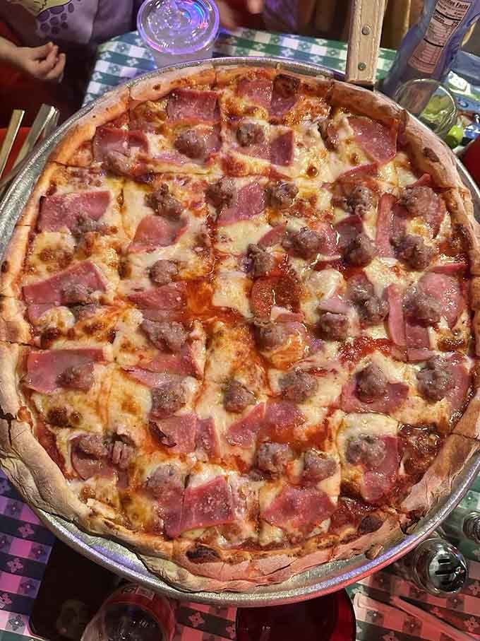 Ham, pepperoni, and sausage unite in glorious harmony, like the Rat Pack of pizza toppings.