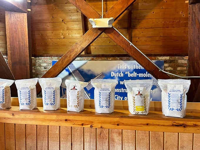 Bags of flour line the shelves, proof this windmill means business about its grain-grinding heritage.