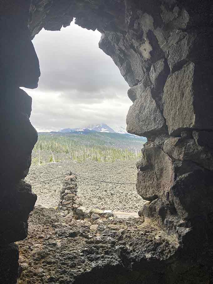 Peering through stone portals reveals why astronauts trained here before walking on actual lunar surface terrain.
