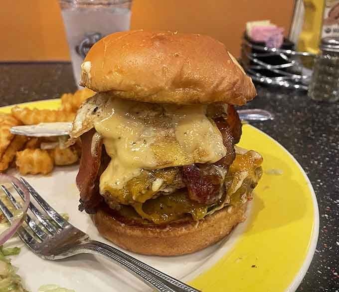 This burger's stacked higher than your expectations, and somehow it still manages to exceed them beautifully.