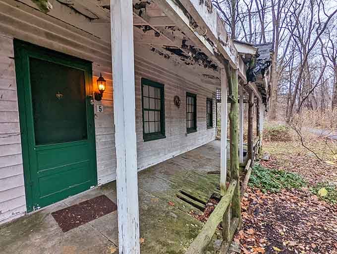 That porch has seen better days, though it's still holding on with more determination than your New Year's resolutions.