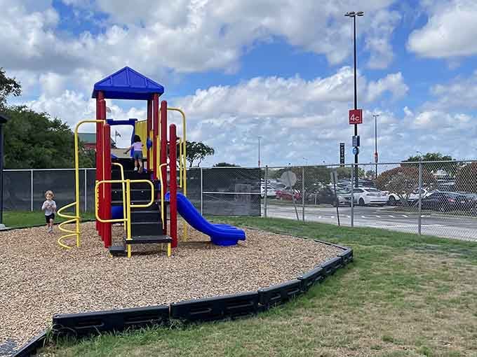 Even the playground equipment stays on theme, preparing the youngest visitors for their future heavy machinery careers.