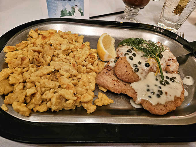 Golden schnitzel with peppercorn cream sauce and sp&auml;tzle proves Germany knew what it was doing all along.