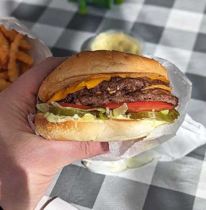 Two patties, double cheese, goop, and pure joy wrapped in wax paper. Washington's finest handheld achievement.