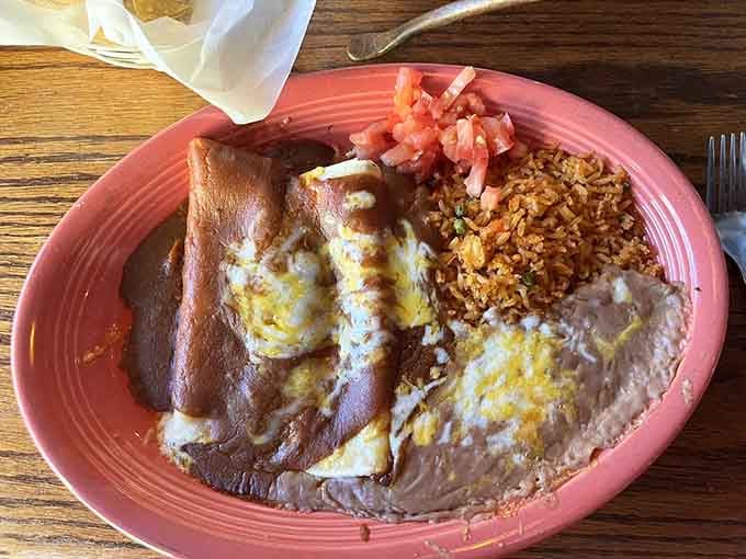 Cheese enchiladas that make you question every tortilla-wrapped decision you've made up until this very moment.